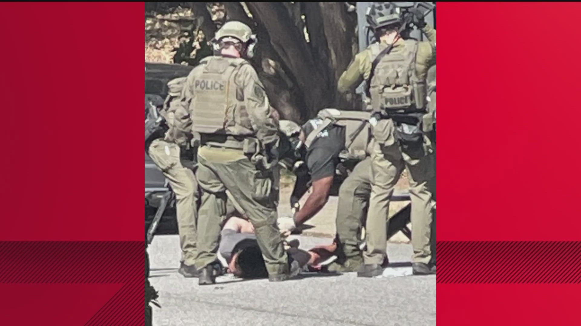 Sandy Springs officer shot, suspect under arrest after SWAT standoff ...