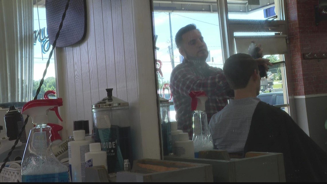 Jimmy's Pat Mell Barber Shop offers free haircuts to police | 11alive.com