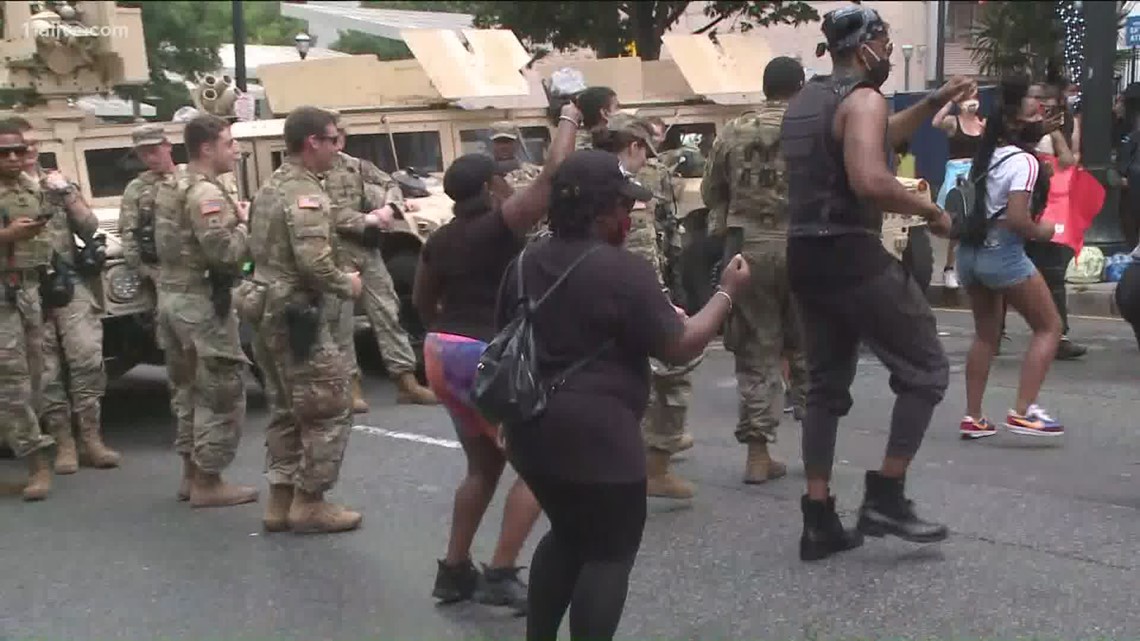 Atlanta protests: National Guard dances with crowd | 11alive.com