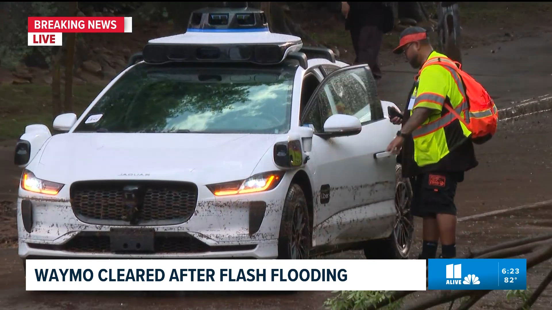 Water seen coming out of Waymo when door opens after being stuck in ...