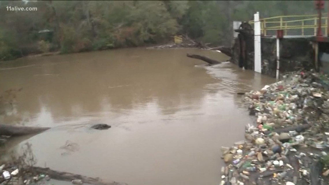 Rivers about to crest above flood stage, washing trash downstream ...