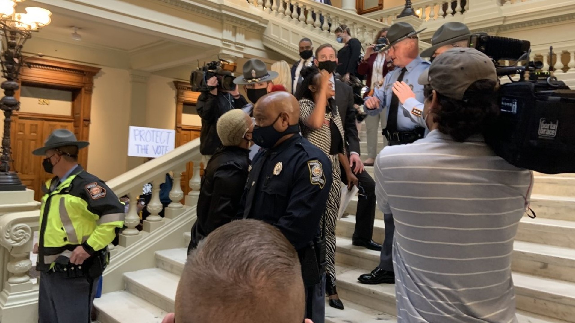 Democratic lawmakers protest GOP election bills at state capitol ...