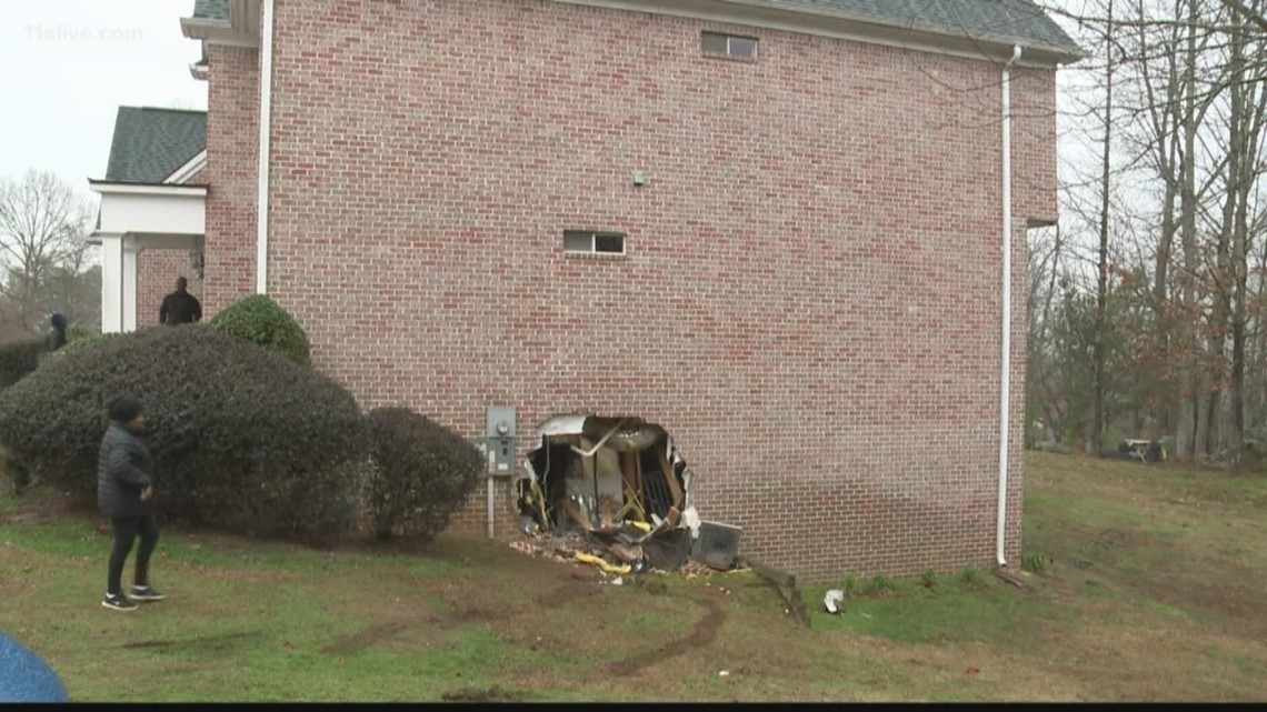 Driver goes into cardiac arrest, crashes into house | 11alive.com