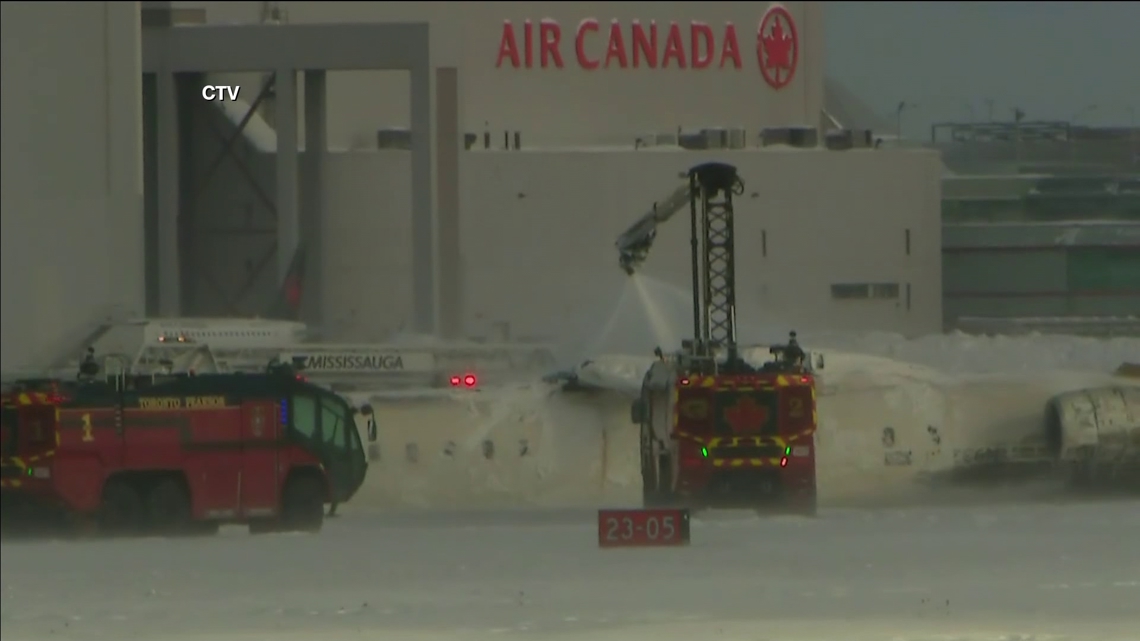 Delta flight crashes at Toronto Airport after landing, flips upside ...