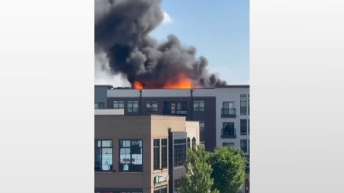 Loud bangs heard as fire engulfs roof of apartment complex in Chamblee ...