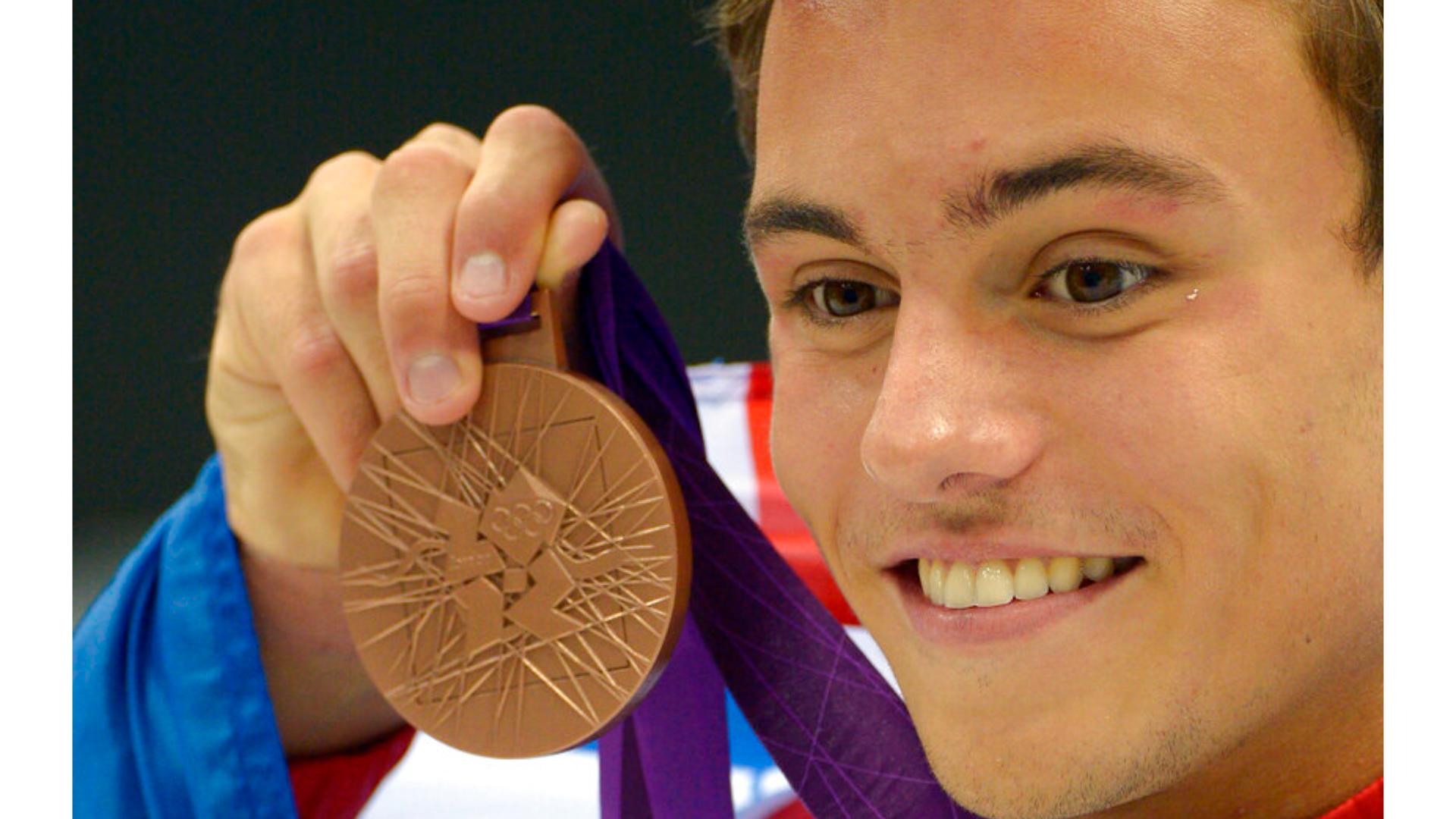 Tom Daley unveils hand-knit sweater during 2024 Paris Games | 11alive.com