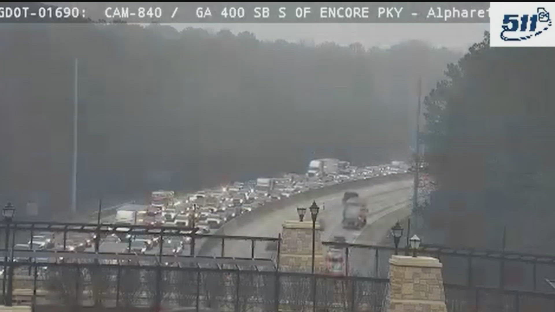 Georgia 400 south closes for hours after driver crashes into message ...