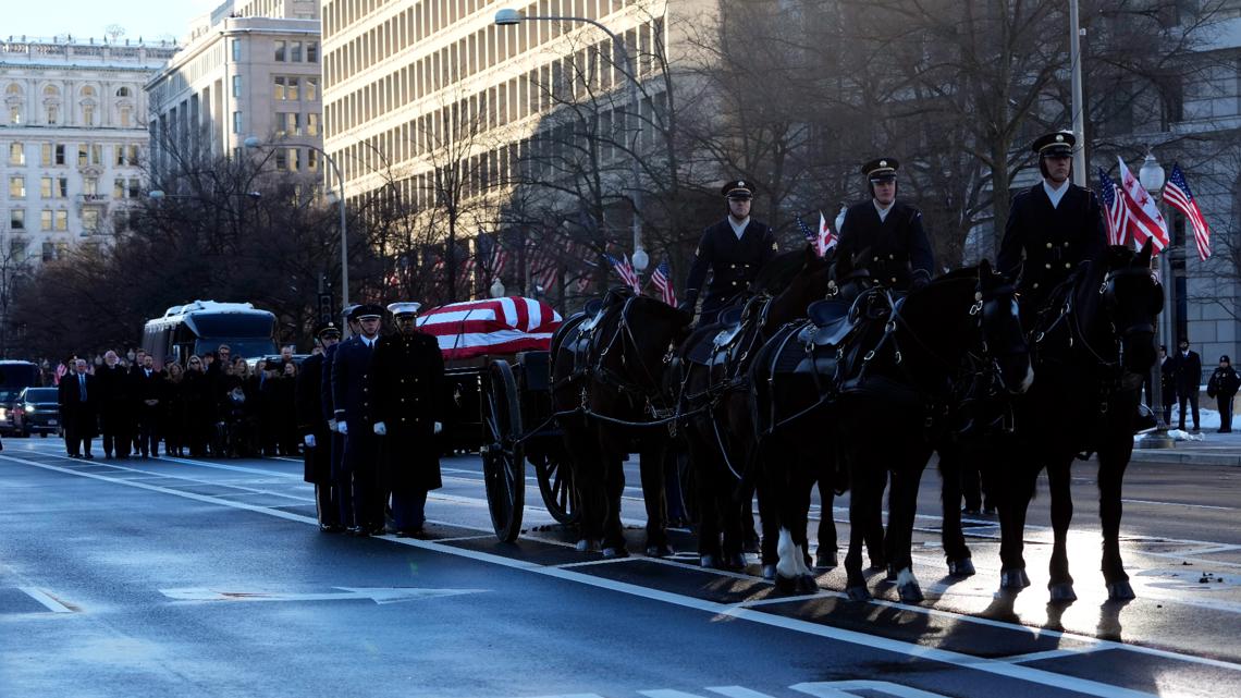 Jimmy Carter's family walks in procession to Capitol | 11alive.com