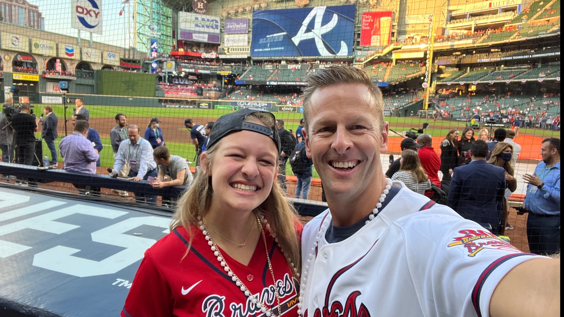 Father-daughter celebrate Braves World Series win at The Battery ...