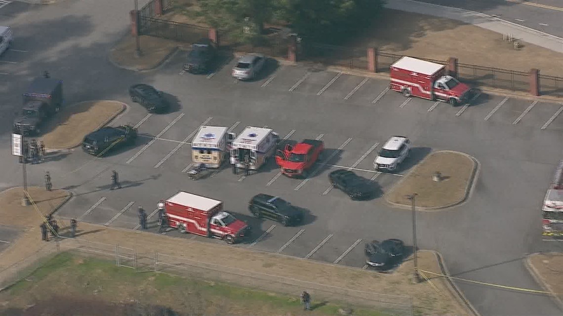 Photos | Scene at McEachern High after 2 shot in parking lot | 11alive.com