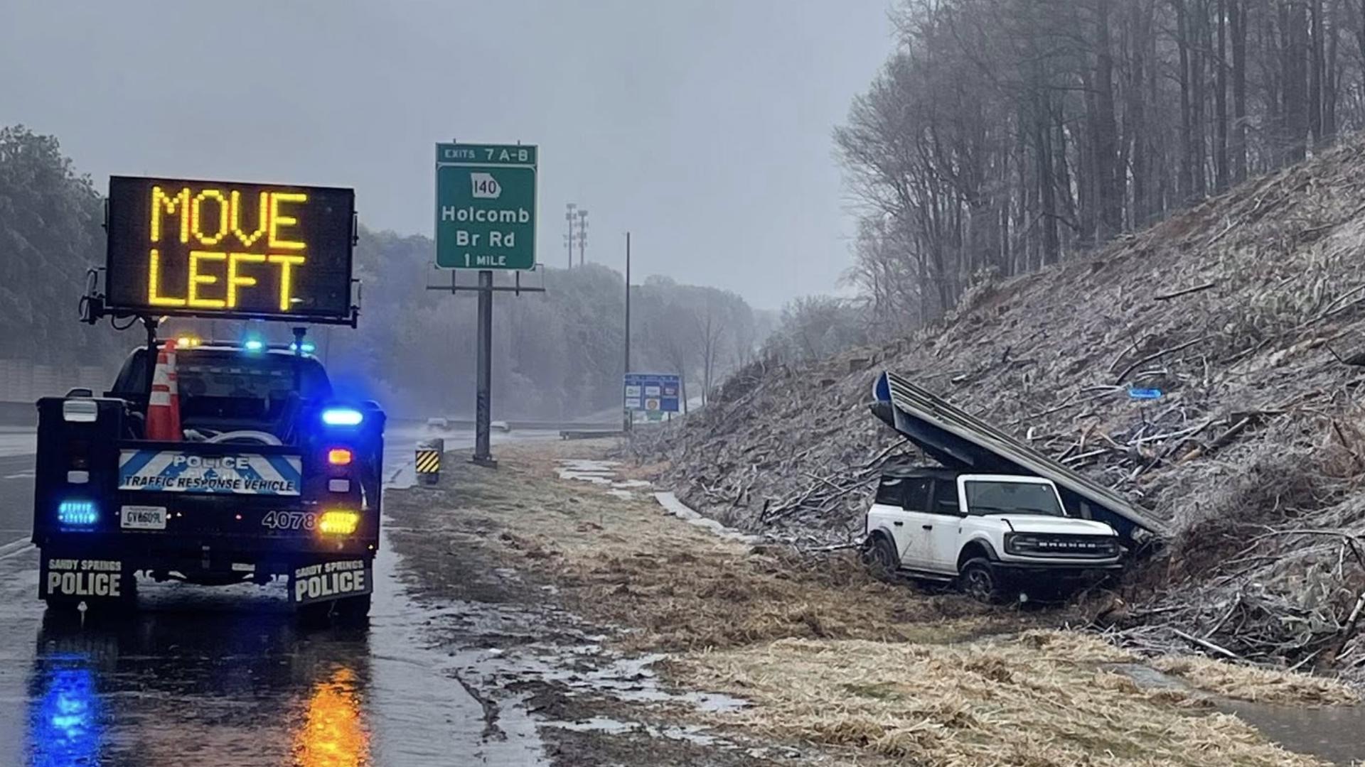 PHOTOS: Flooding on GA-400 north, south causing delays in Sandy Springs ...
