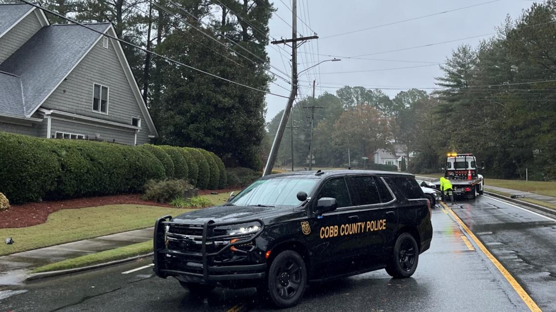 Portion of busy Cobb road closes after damage to power pole | 11alive.com
