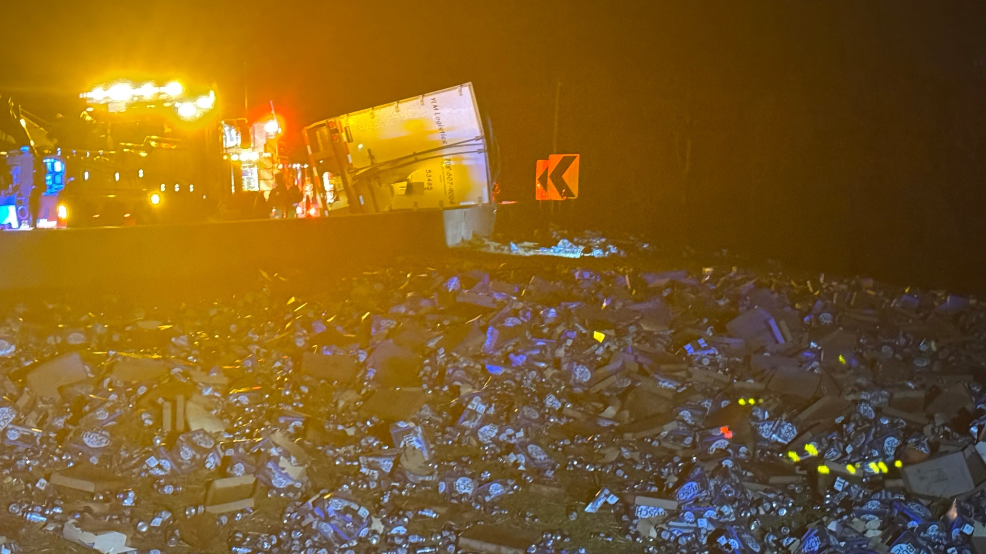 Semi overturns, dumps Busch Ice across DeKalb highway ramp | 11alive.com