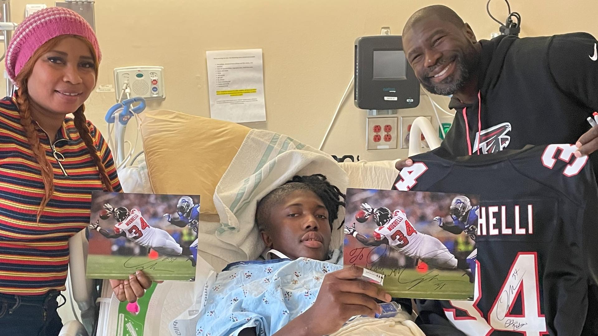 Former Falcons star surprises football player with traumatic brain ...