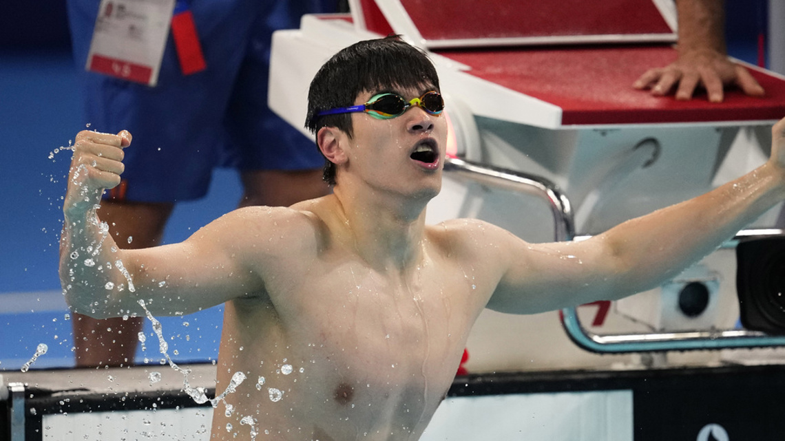 Pan Zhanle breaks world record in men's 100m freestyle final | 11alive.com