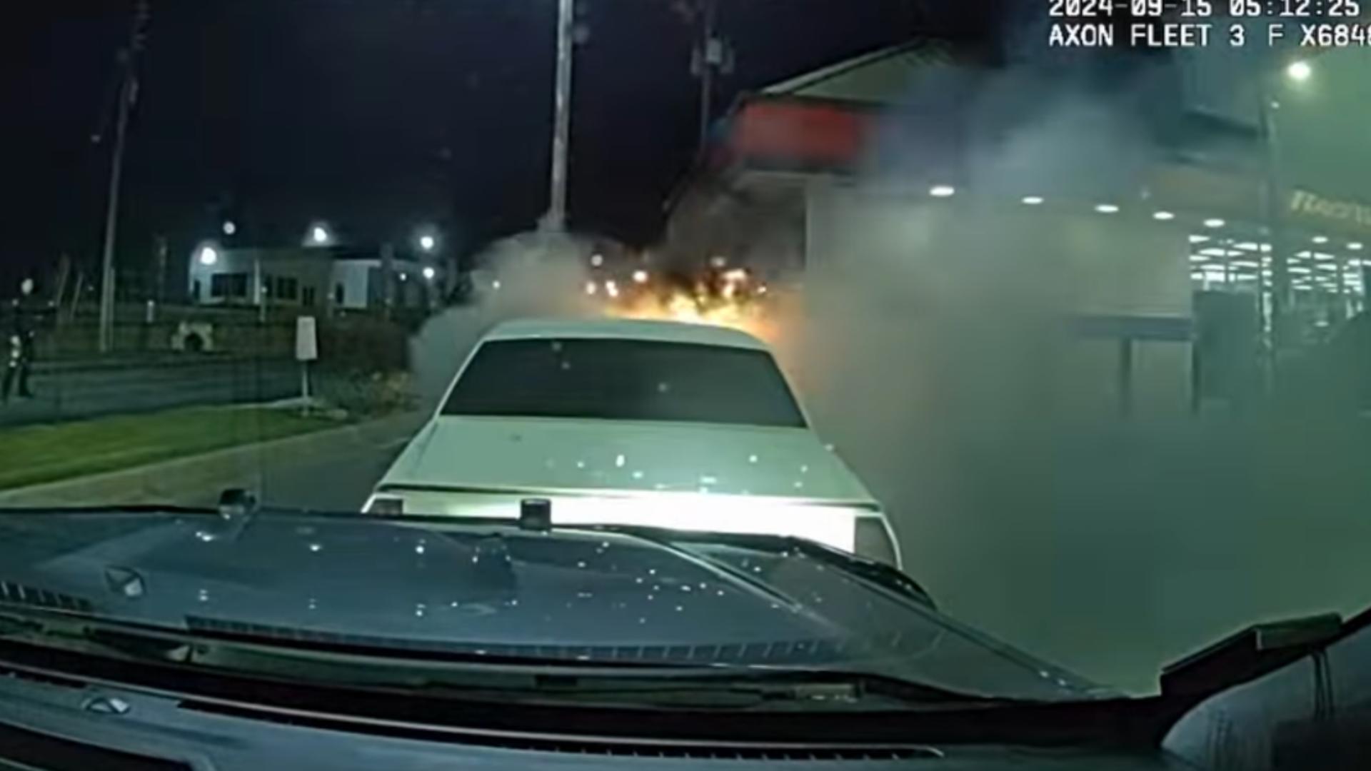 Stockbridge Police dashcam video of officer helping car on fire at gas ...