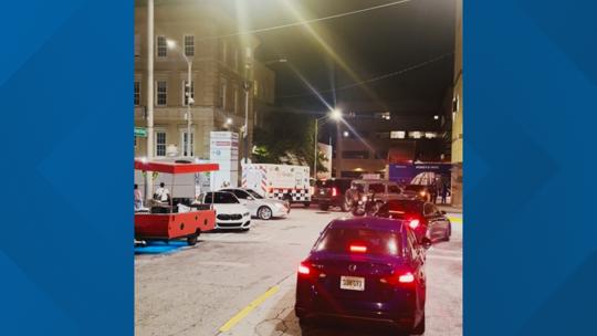 Ambulances slowed by food trucks, parked cars outside Grady ER raise ...