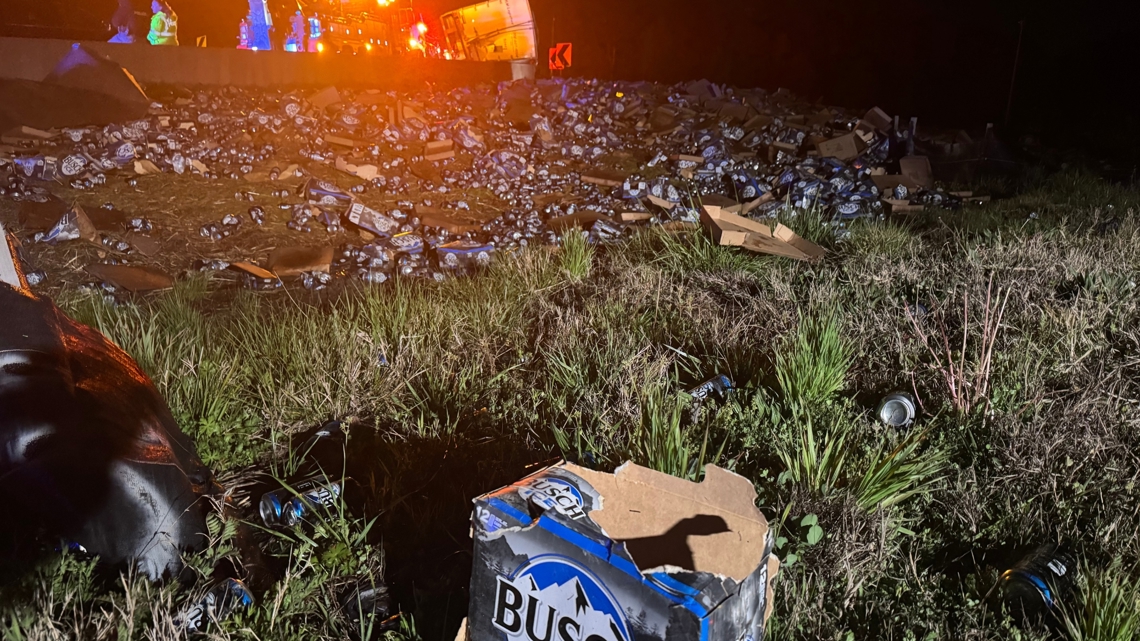 Semi overturns, dumps Busch Ice across DeKalb highway ramp | 11alive.com