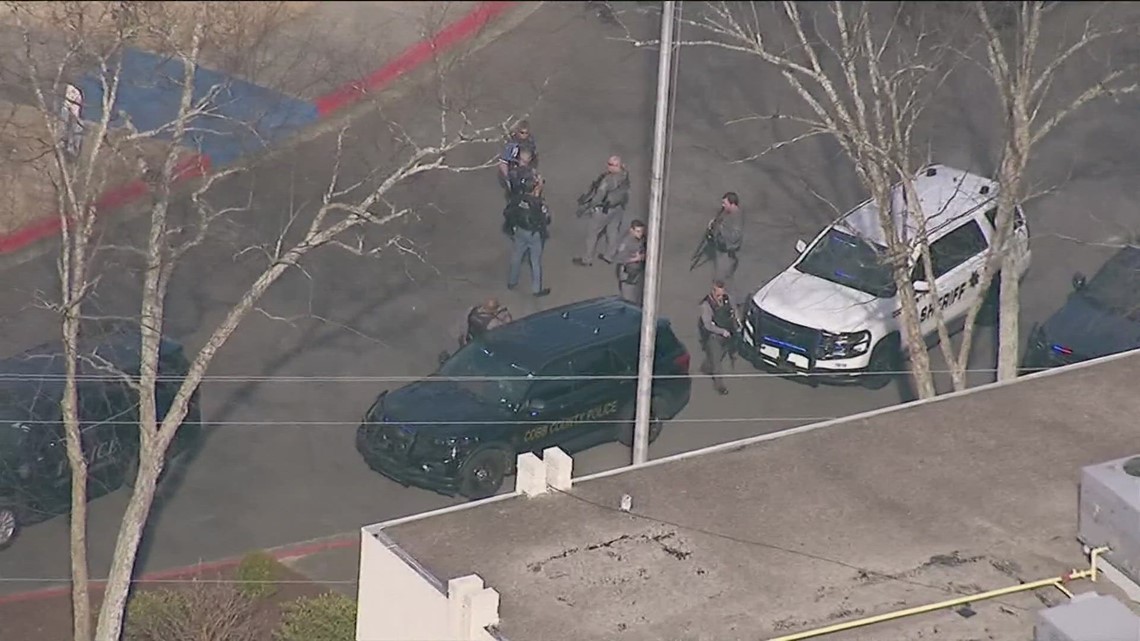 McEachern High School secure after two non-students shot in parking lot ...