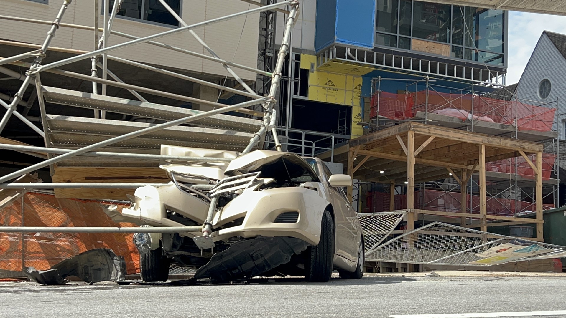 Photos: Car crash in Midtown causes scaffolding from construction site ...