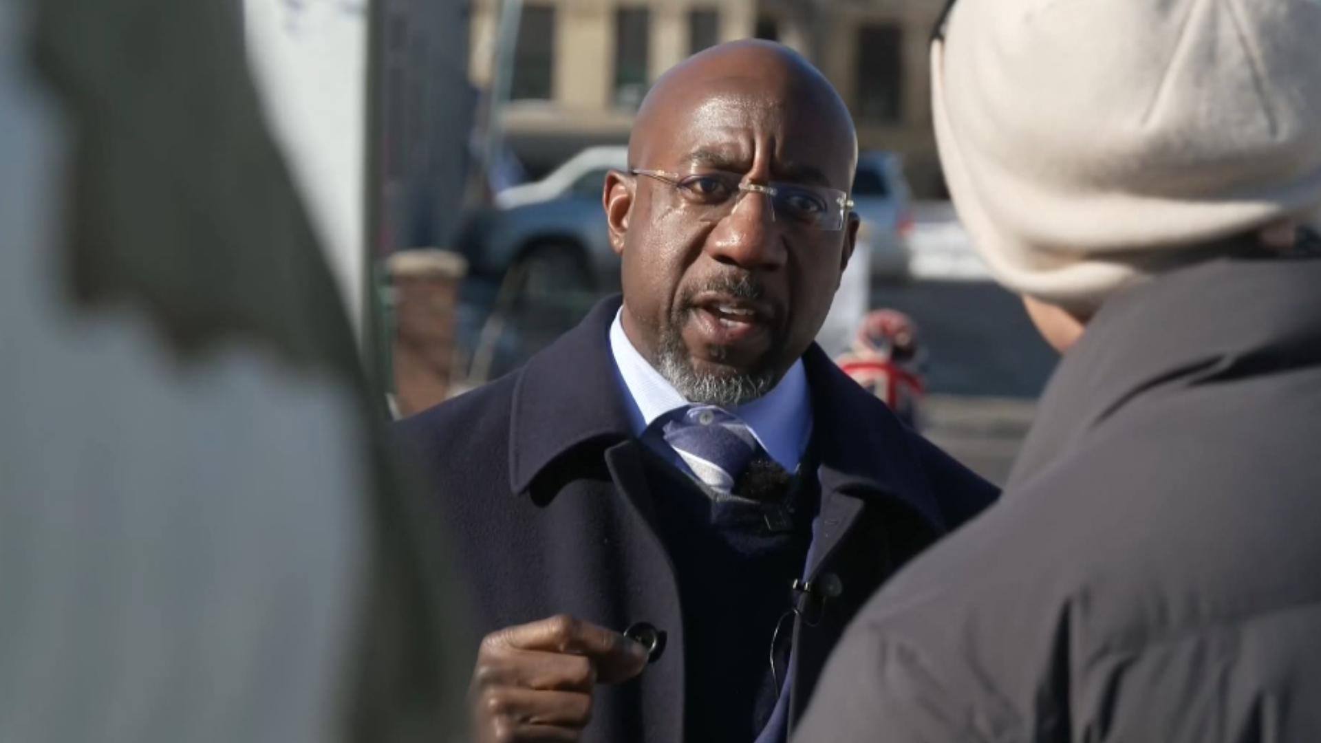 Sen. Warnock visits memorial site for Alex Pretti in Minneapolis, says ...