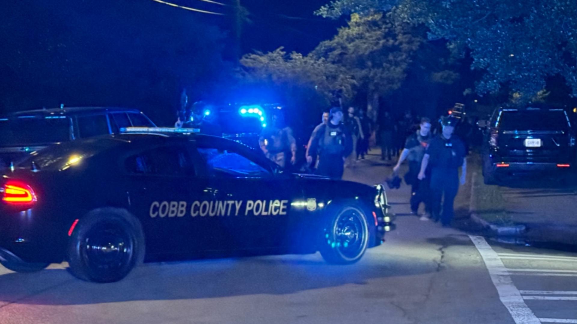 Cobb County crime SWAT units take person into custody at home | 11alive.com