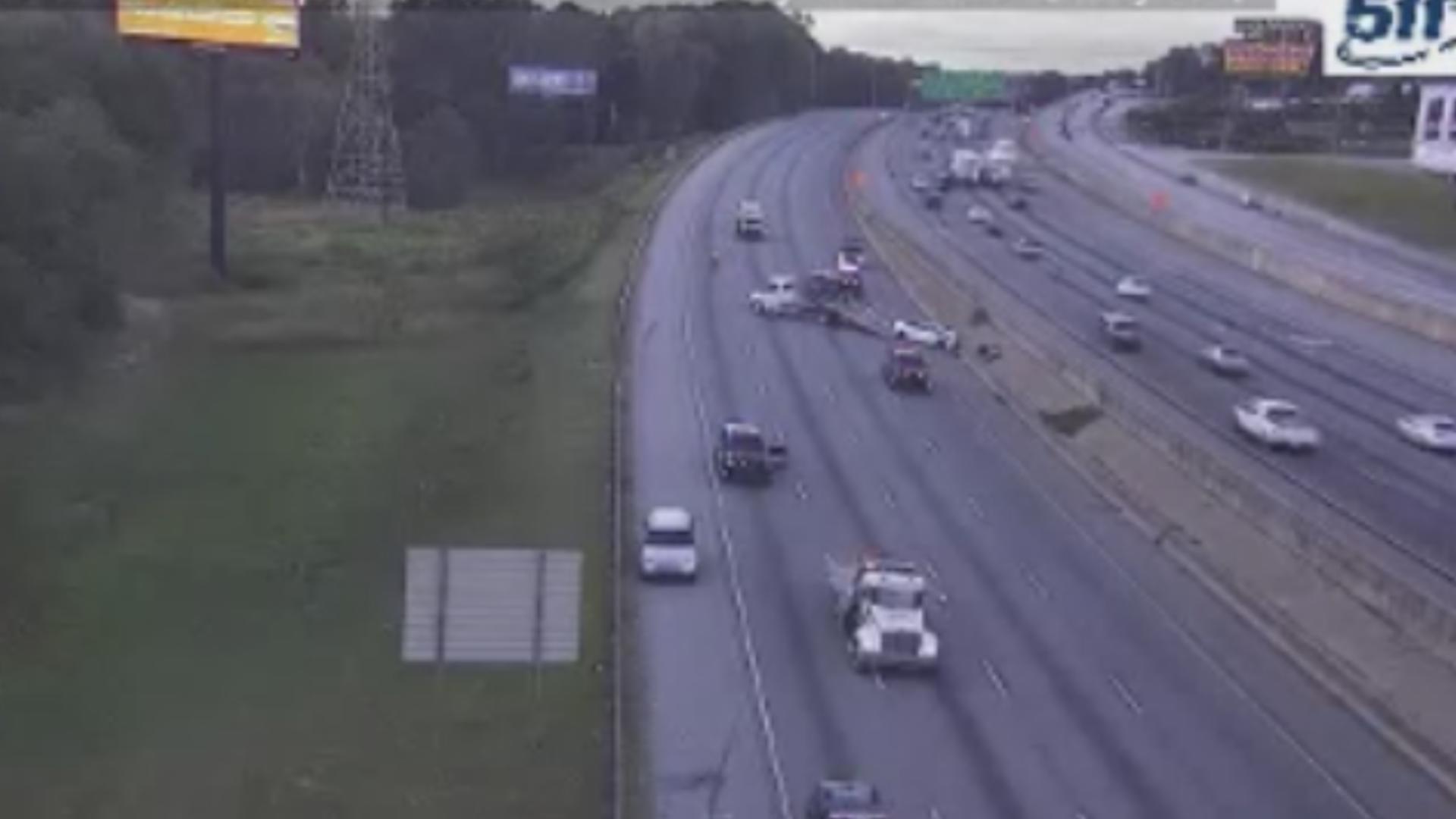 Deadly multi-vehicle crash closes all lanes of I-75 near airport | 11alive.com