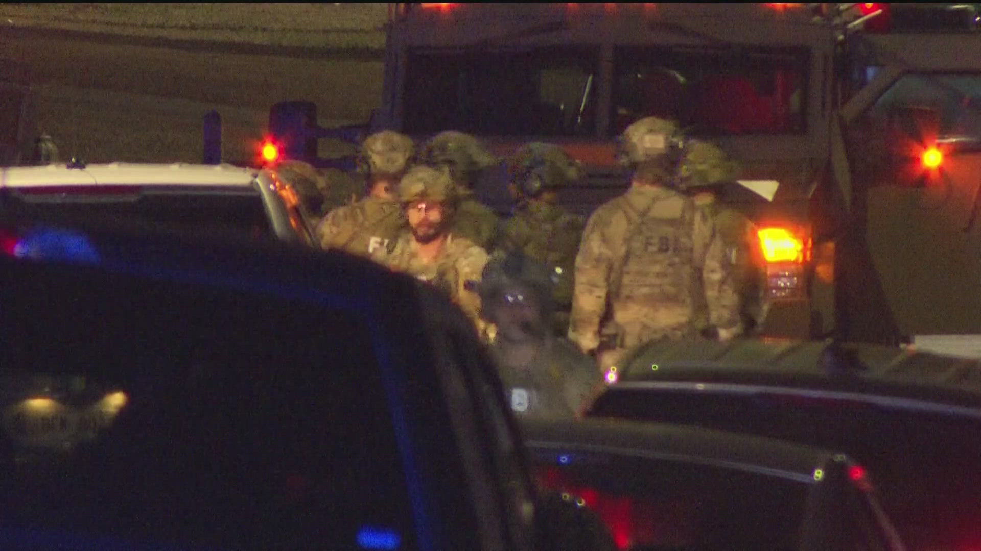 Person of interest in custody in shooting that killed postal worker ...