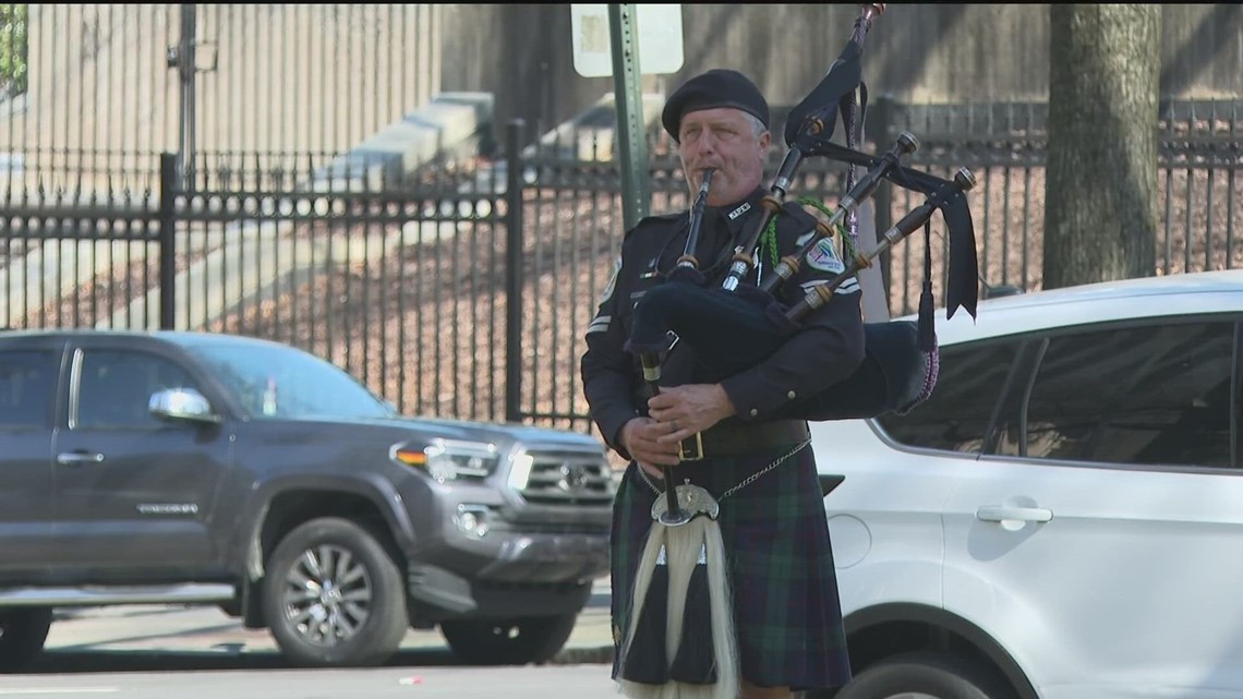 Father O'Reilly wreath laying ceremony | 11alive.com