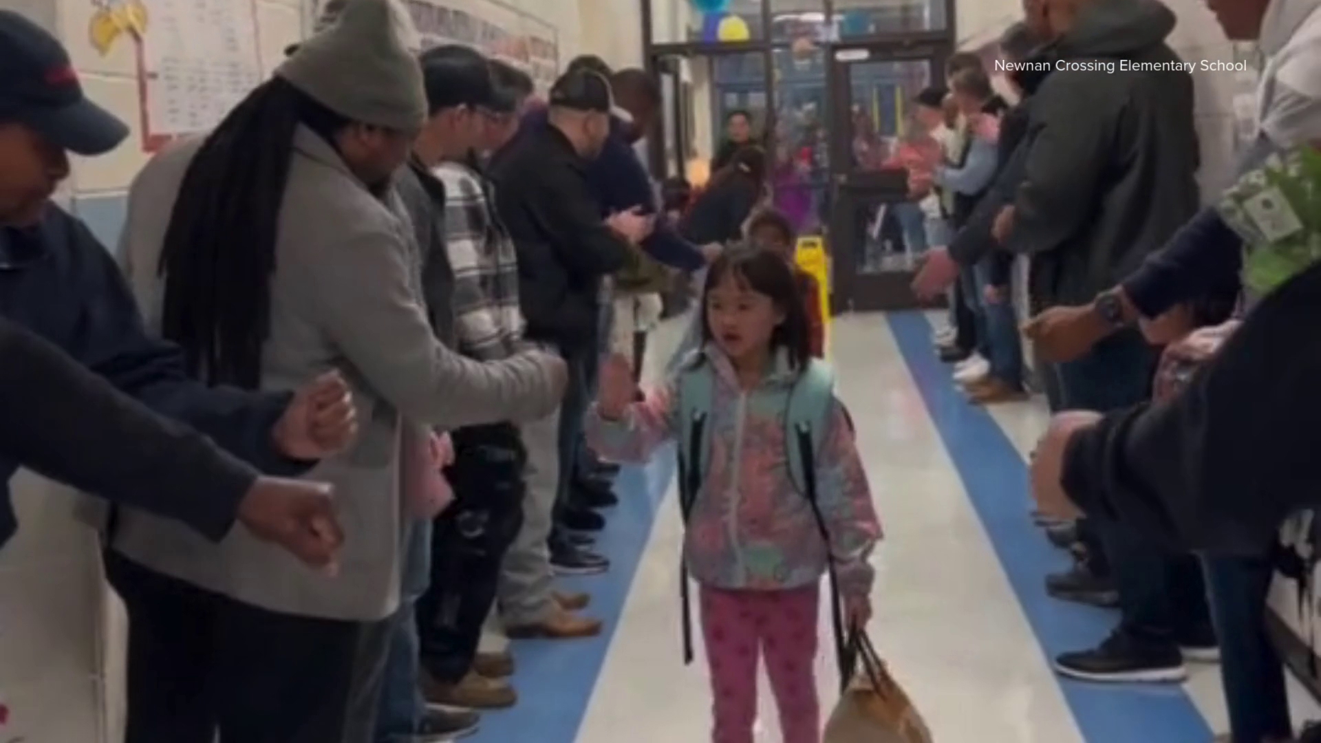 Hundreds of dads make a difference with Newnan Crossing’s ‘Fist Bump ...