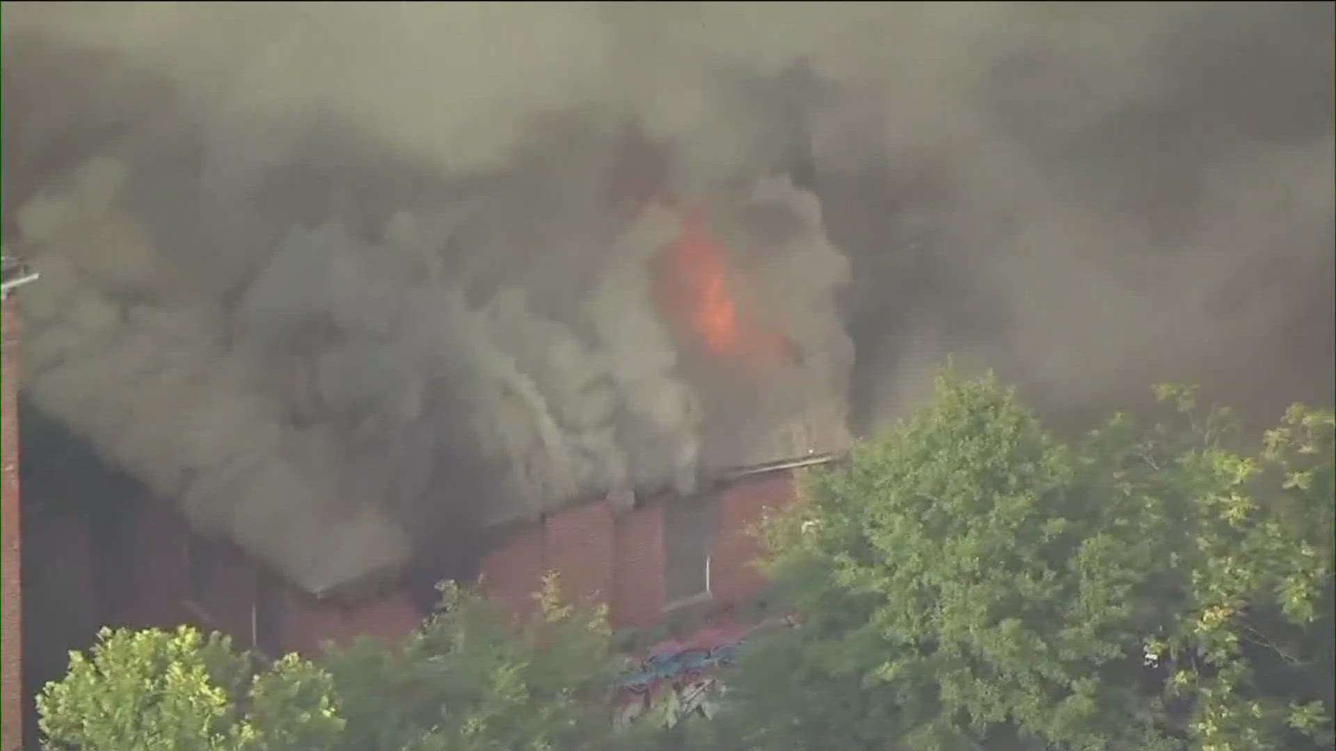 Fire crews battle blaze at previously burned historic building near ...