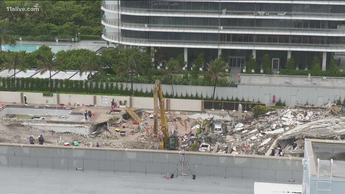 Tropical storm poses threat for rescue crews searching through rubble ...