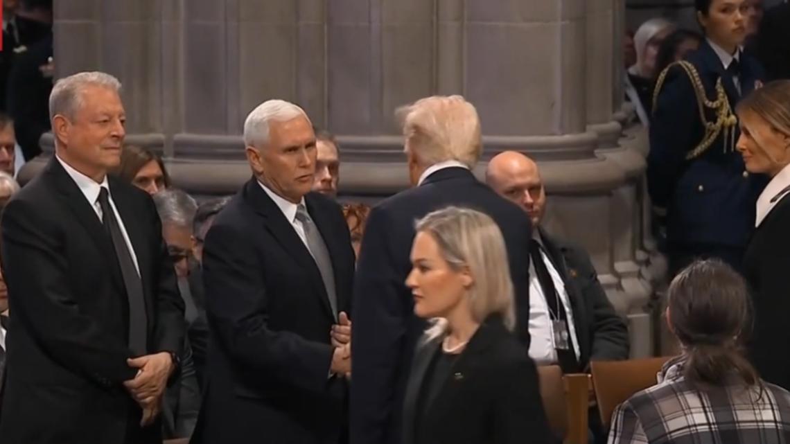 Donald Trump Mike Pence handshake video Jimmy Carter funeral | 11alive.com