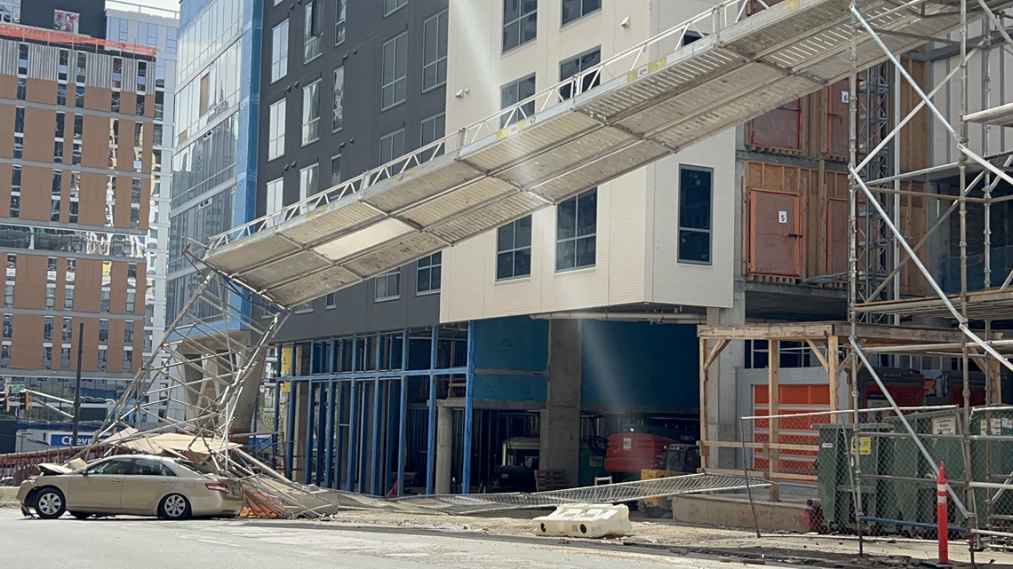 Photos: Car crash in Midtown causes scaffolding from construction site ...