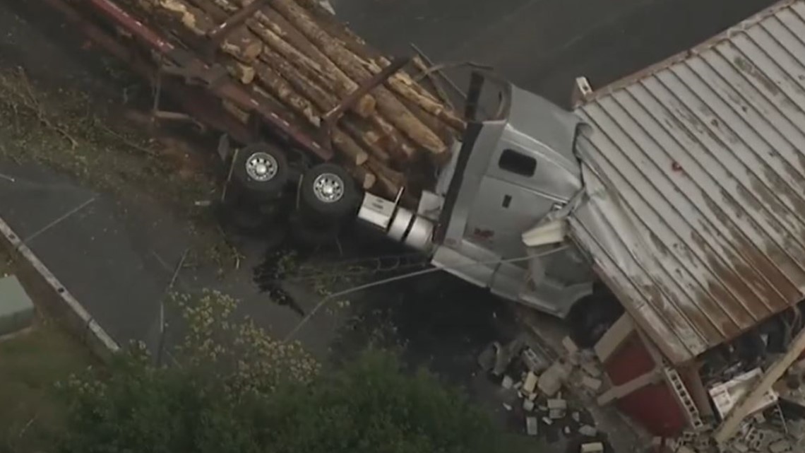 Log truck crashes into storage facility on Snapfinger Woods Drive ...