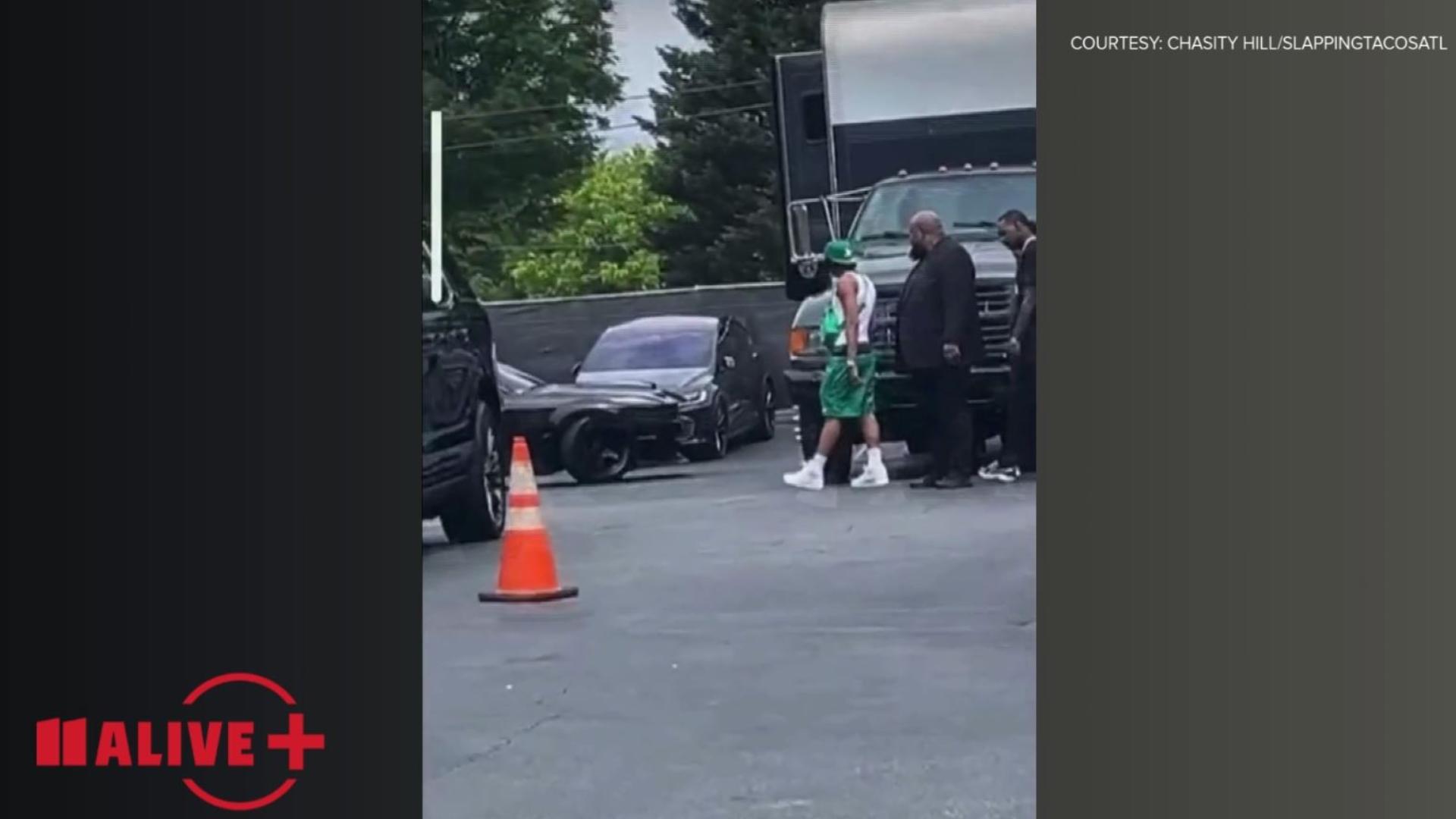 Rapper Lil Baby seen in area where music video was being filmed before ...