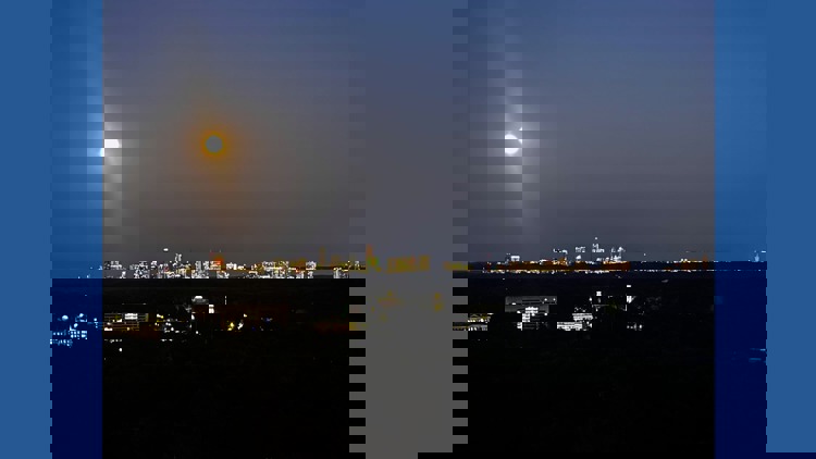 Weather Impact Photos | Last full moon of summer rises with a golden glow in Georgia skies ...