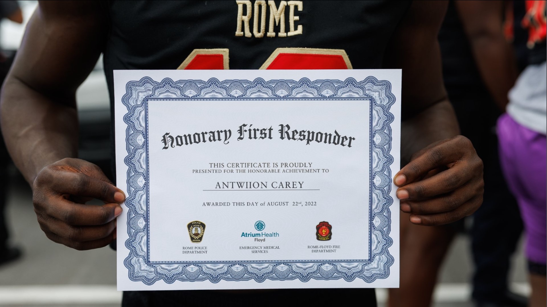 Heroic Rome football players celebrated by local first responders ...