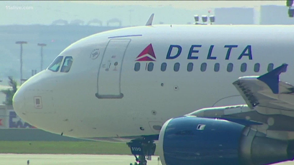 Delta fight attendant hit by passenger on plane | 11alive.com